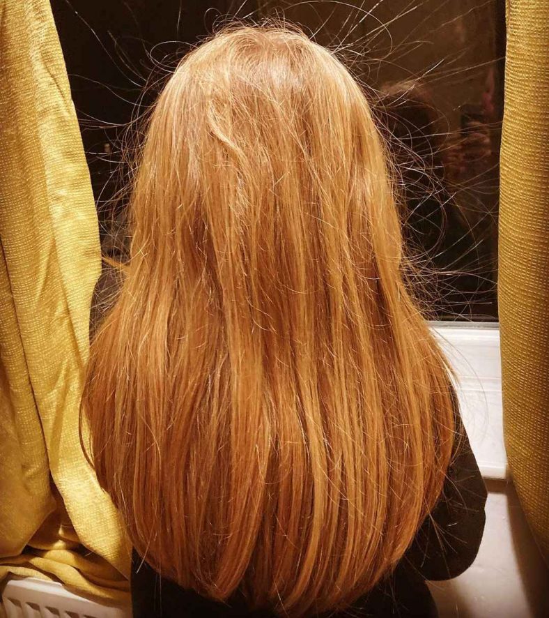 Why Does My Hair Stick Up? (4 Ways to Fix Sticking Hair)